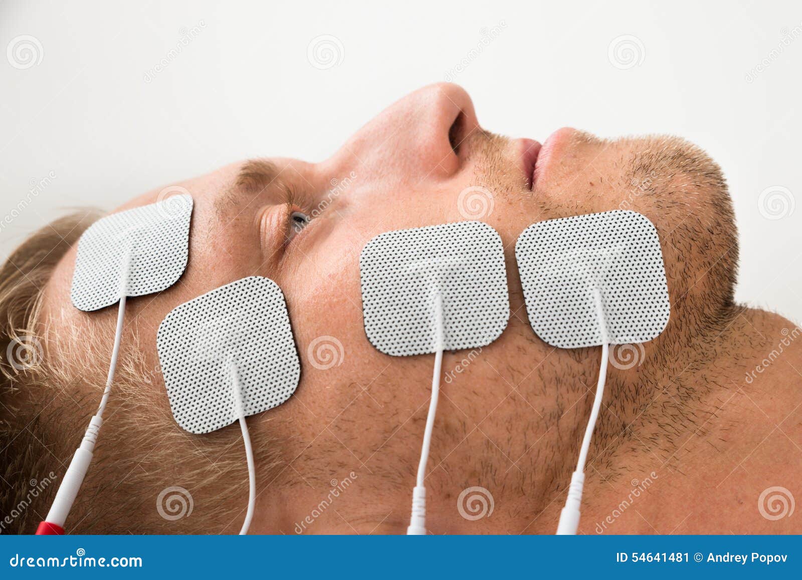Close-up of Man with Electrodes on Face Stock Image - Image of hair ...