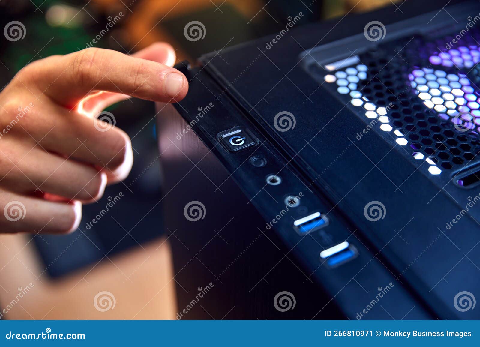 Close Up of Man Gaming at Home Turning Power Switch on Computer on or ...