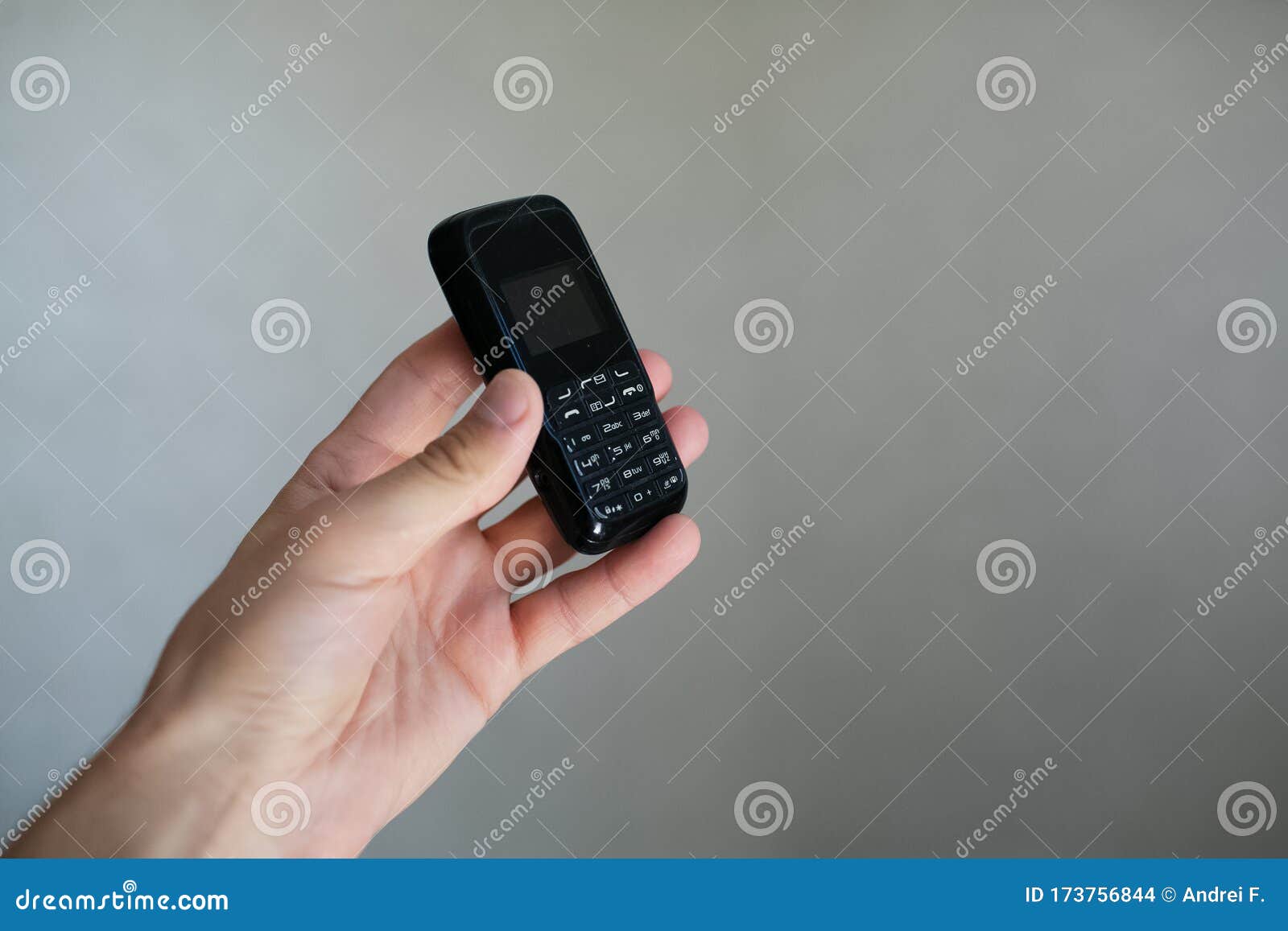 Close-up of Man Hand Holding Old Black Mobile Phone. Stock Photo ...