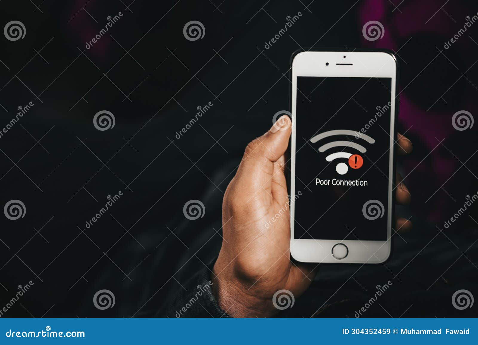 Close Up of Man Hand Holding a Smart Phone with Sign Bad Connection on ...