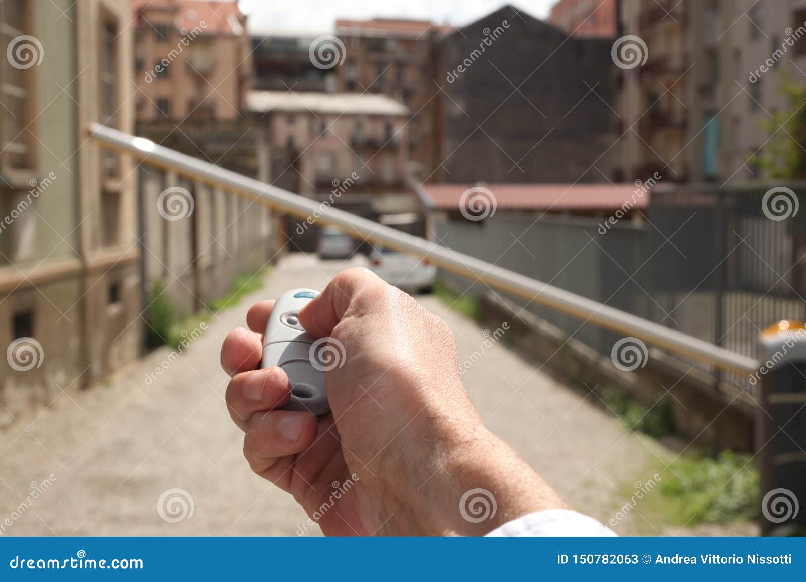 Close Up on Man Hand Opening a Gate with a Remote Control Stock Image ...