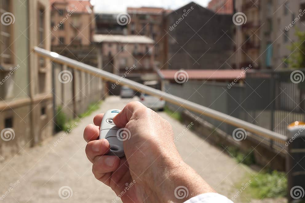 Close Up on Man Hand Opening a Gate with a Remote Control Stock Image ...