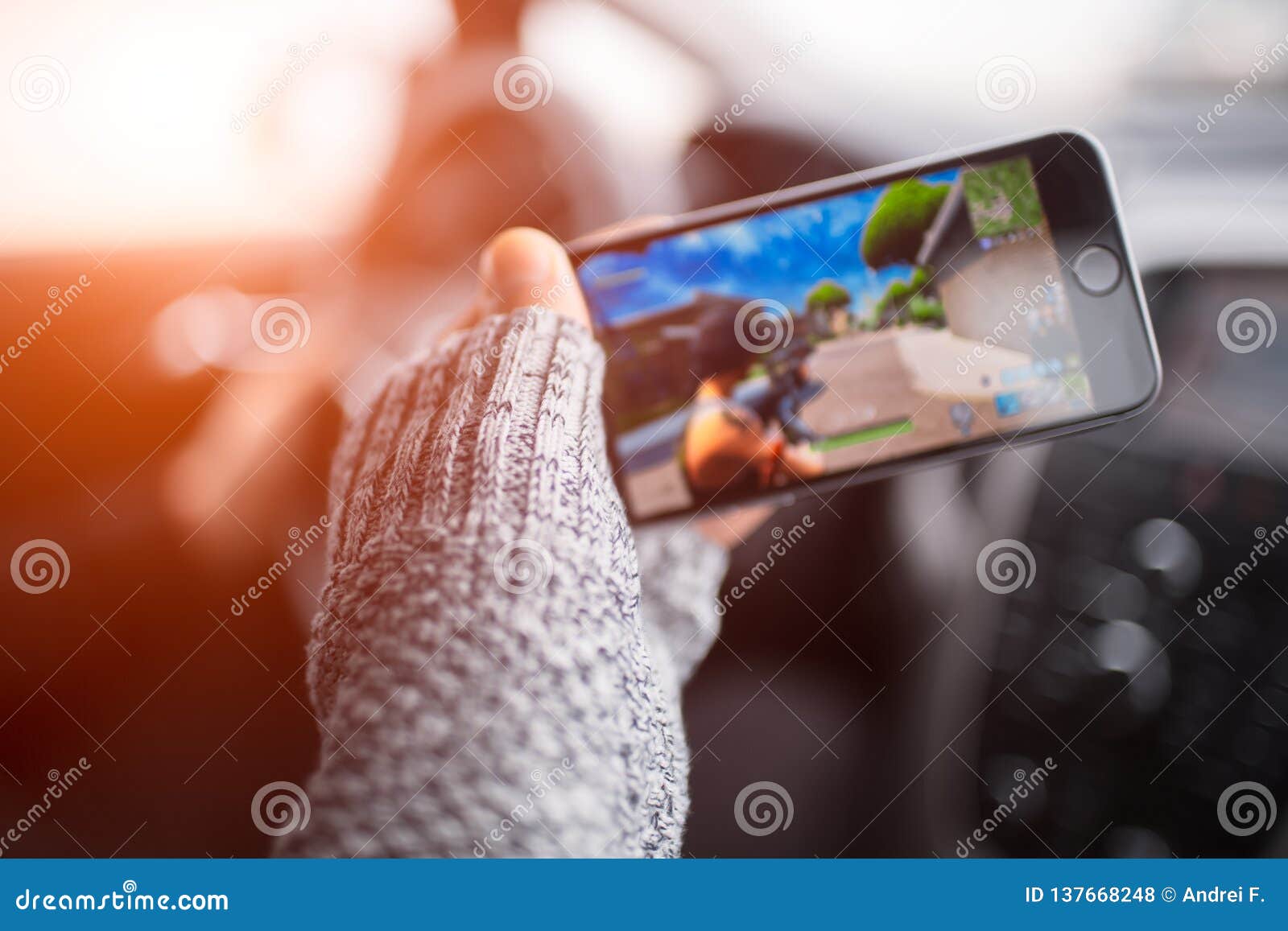 Close-up of Man Hand Playing Video Games on Smartphone Stock Photo ...