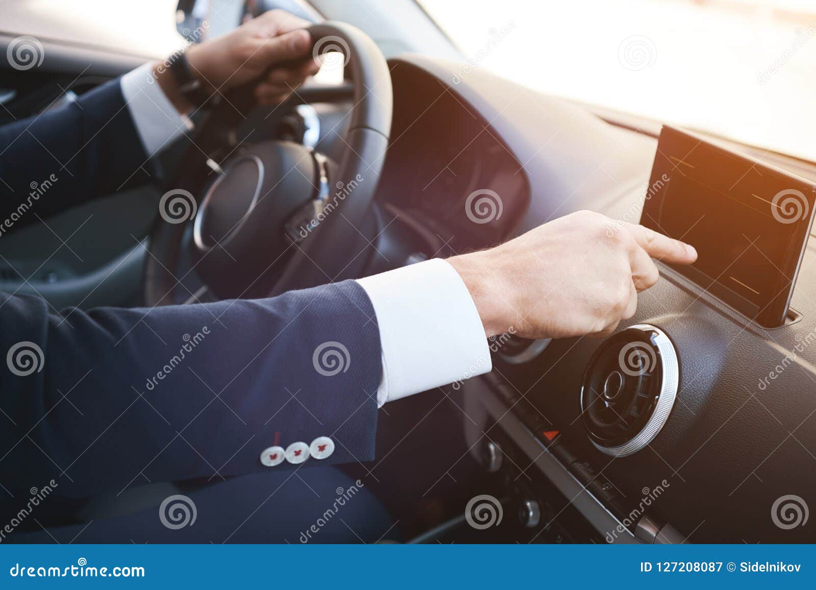 Close-up of a Man Hand Touching Black Screen Smartphone on a Dashboard ...