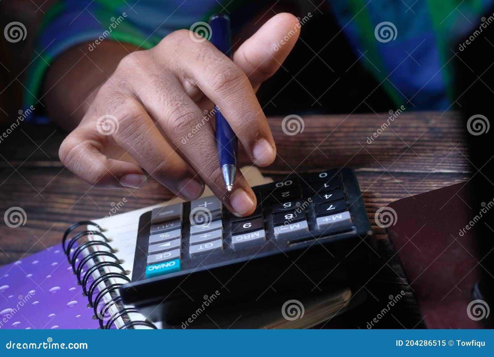 Close Up of Man Hand Using Calculator Stock Image - Image of notepad ...