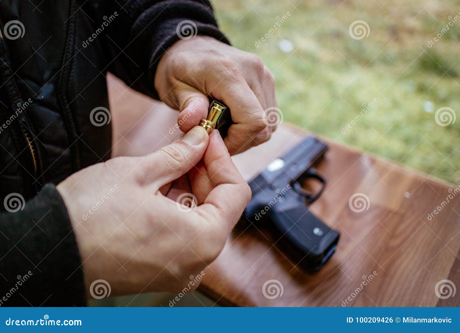 Loading Gun stock photo. Image of magazine, focus, weapon - 100209426