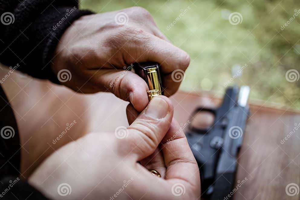 Loading Gun stock photo. Image of handgun, pistol, load - 100209854