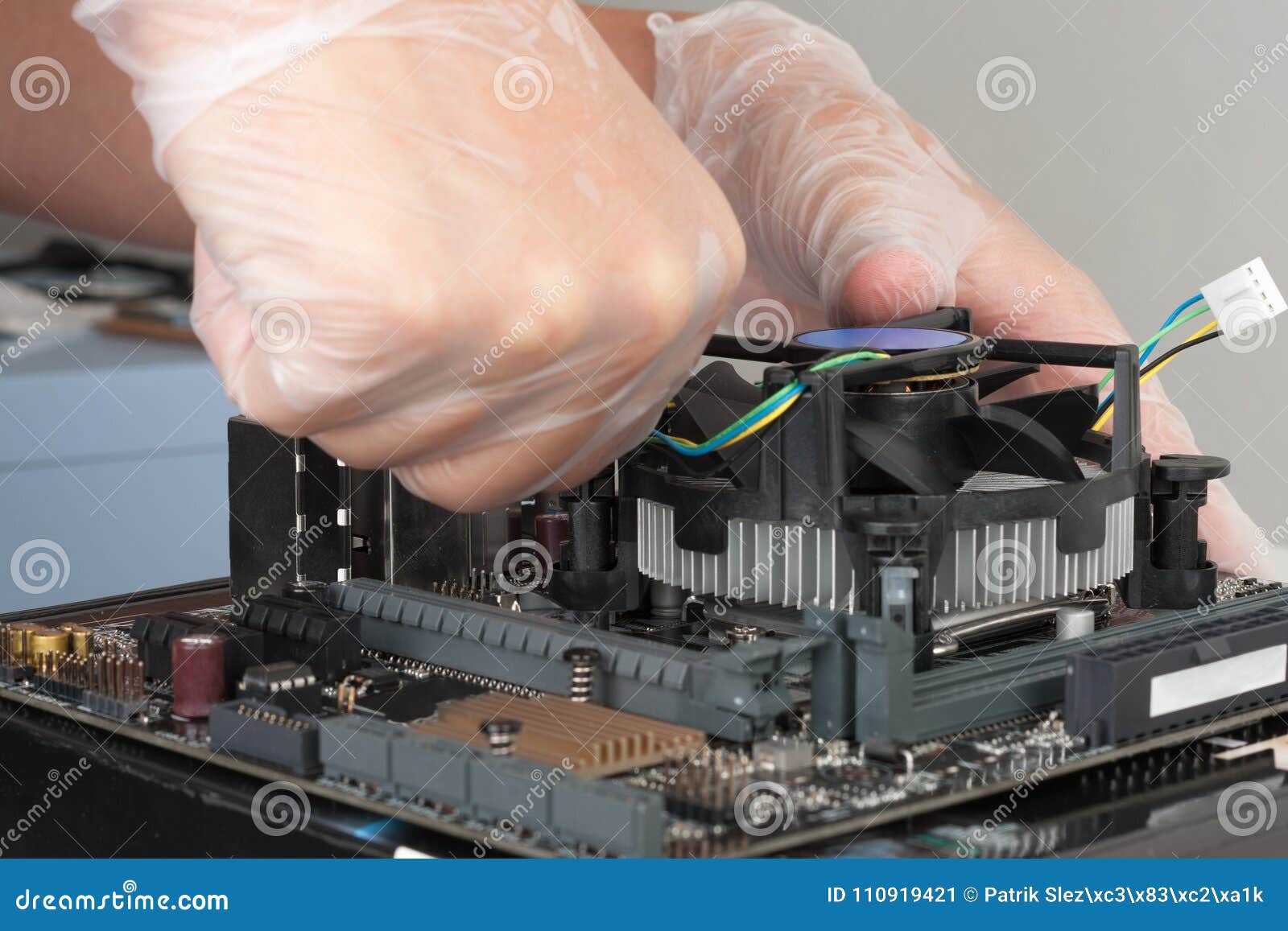 Close Up of Man Hands Installing CPU Cooler Fan on New, Modern Stock ... Close Up of Man Hands Installing CPU Cooler Fan on New, Modern Stock ...