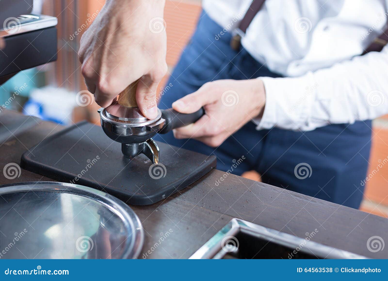 Close-up of Man Hands Pressing Coffee in Holder Stock Photo - Image of ...