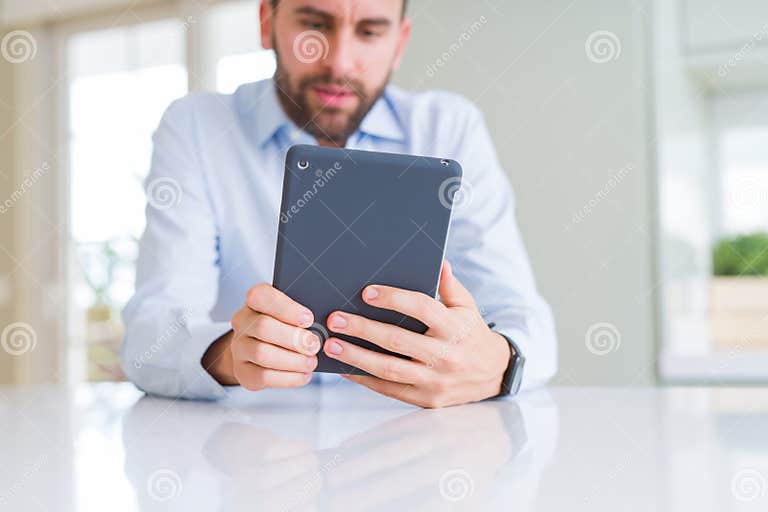 Close Up of Man Hands Using Tablet and Smiling Stock Photo - Image of ...