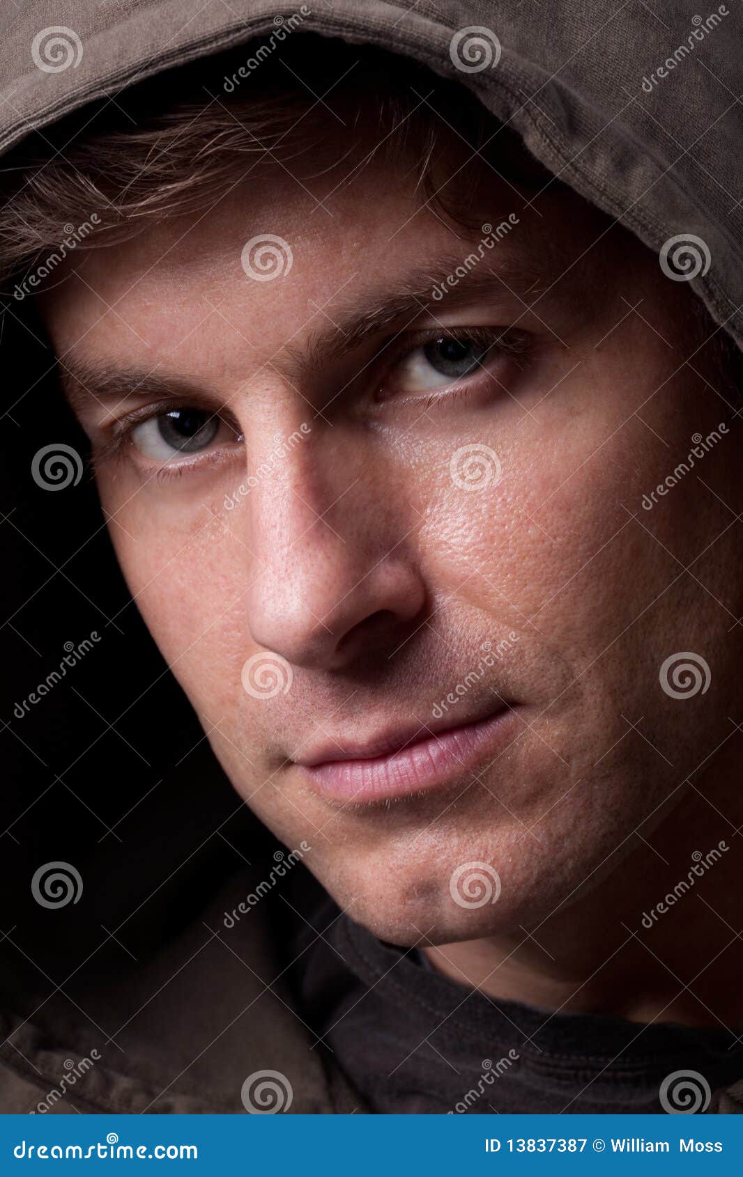 Close Up of Man in Hood stock image. Image of close, headshot - 13837387