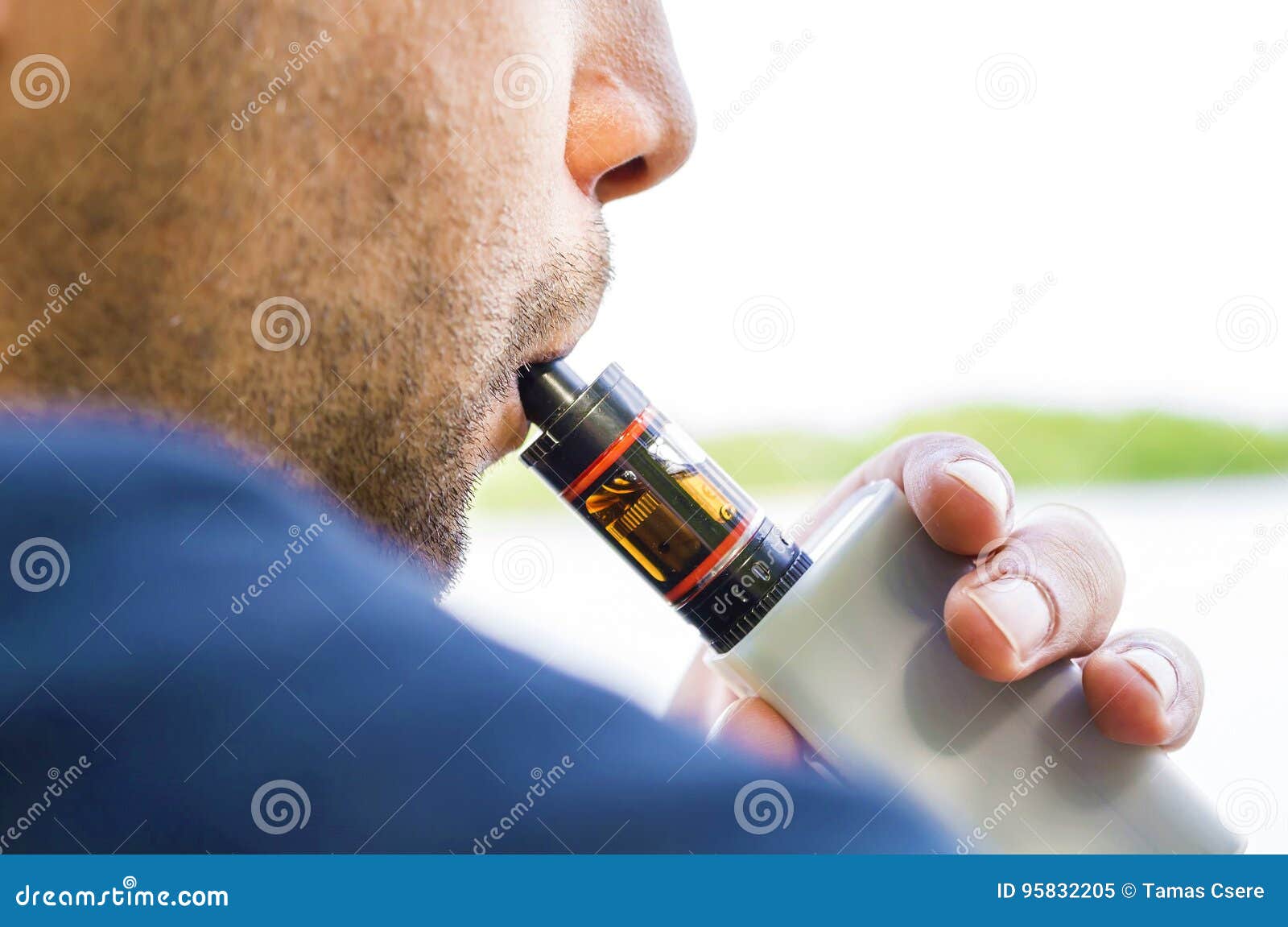 Close Up of a Man Inhaling from an Electronic Cigarette Stock Image ...