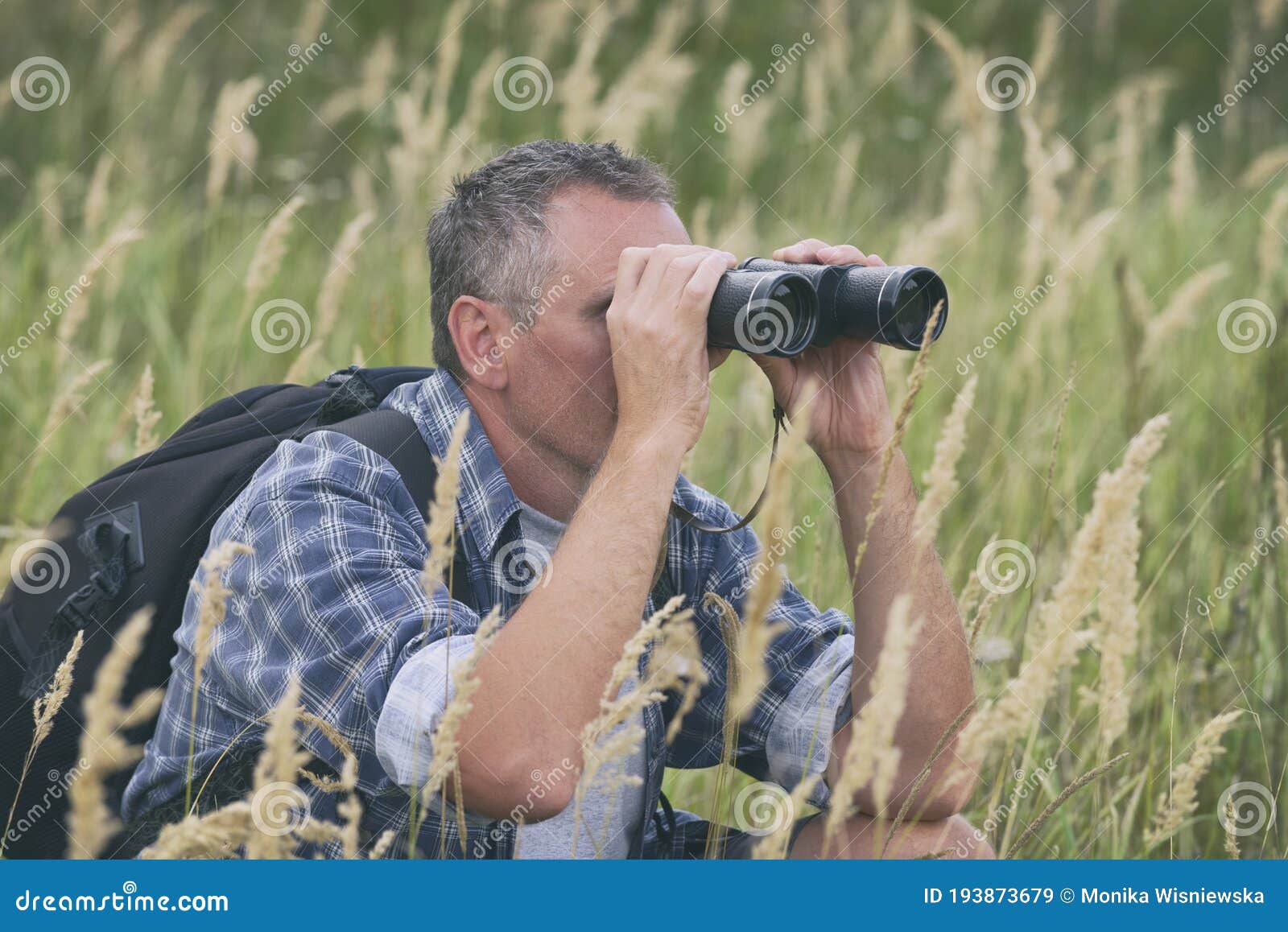 Man Looking through Binocular Stock Image - Image of explorer, male ...