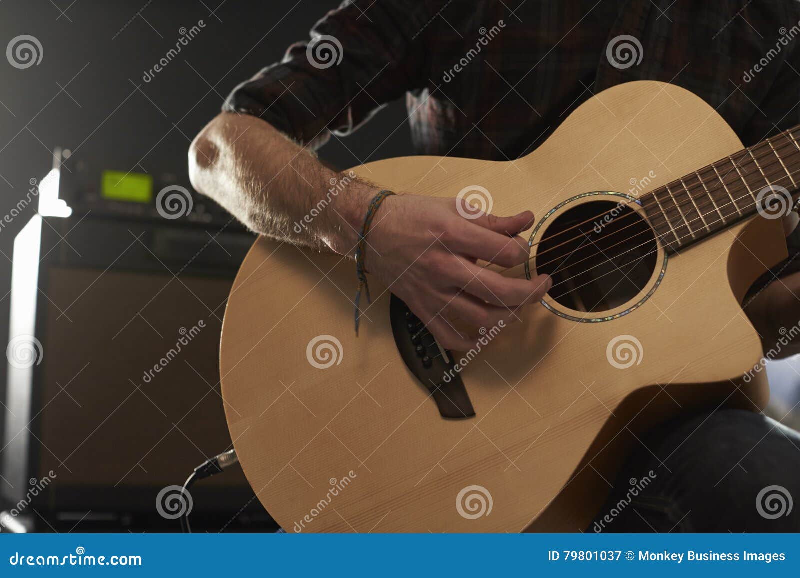 Close Up of Man Playing Amplified Acoustic Guitar Stock Image - Image ...
