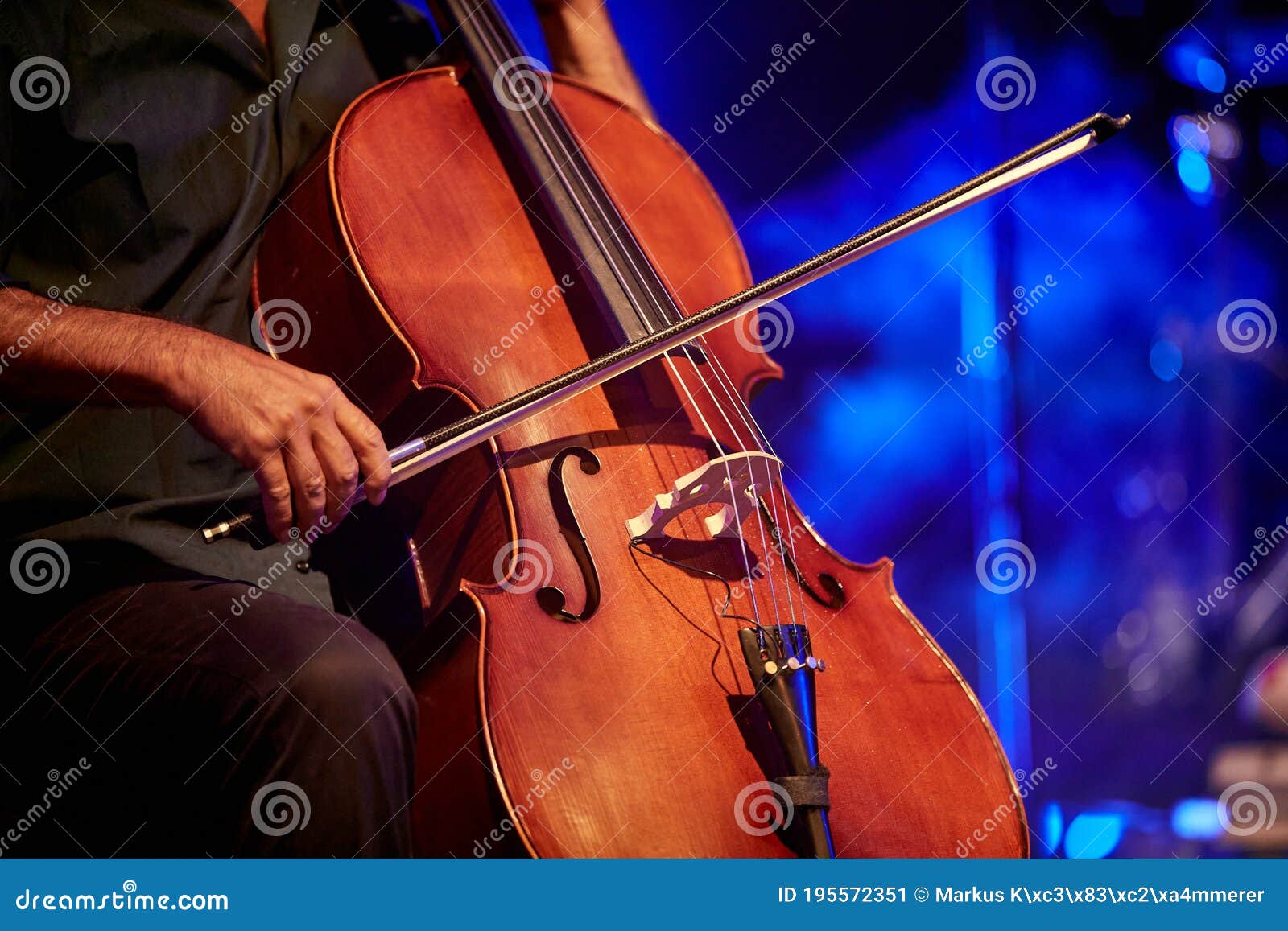 Man playing cello close up stock image. Image of wood - 195572351