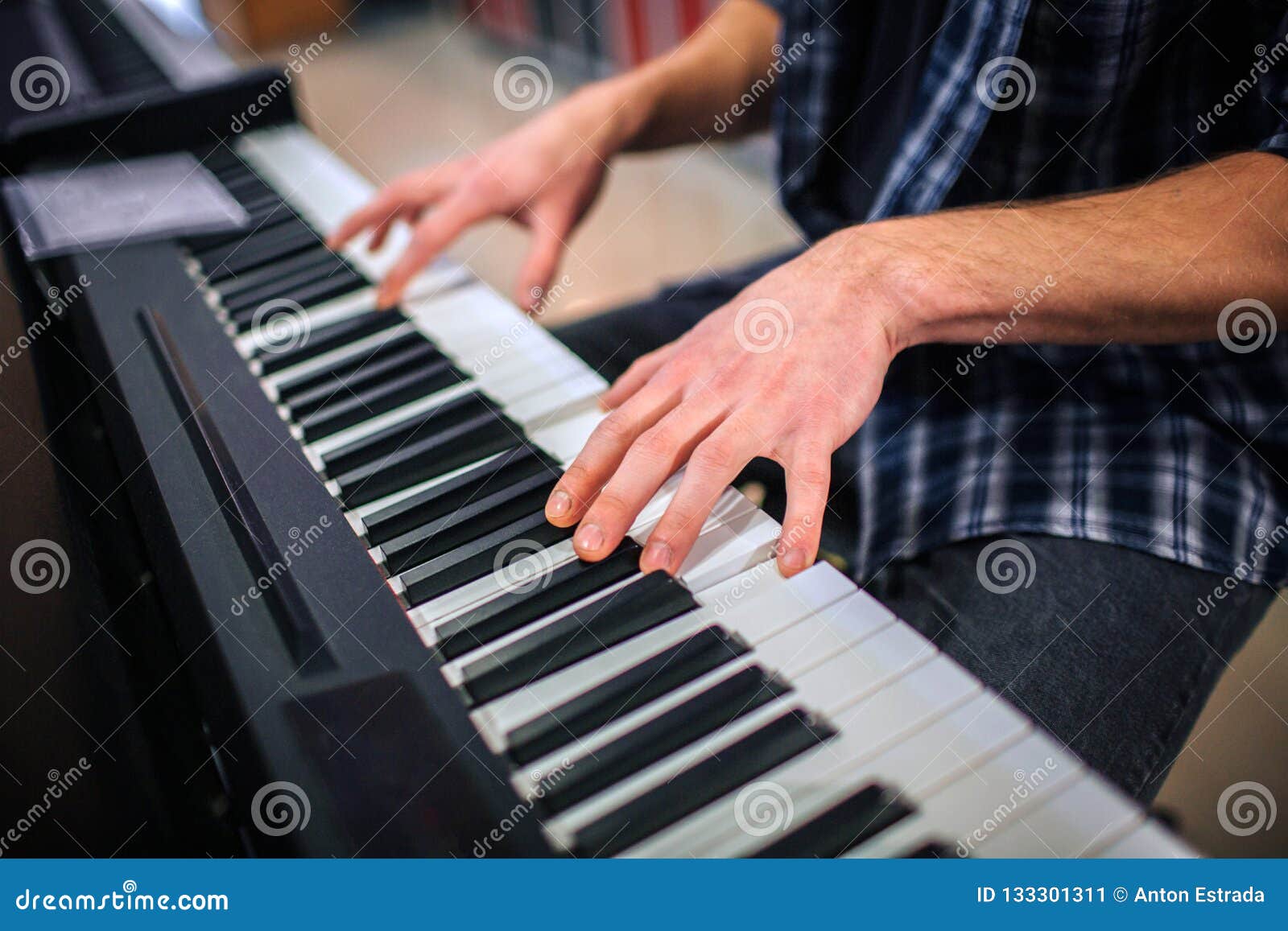 Close Up of Man Playing on Keyboard. he Sits Alone in Room. Stock Image ...