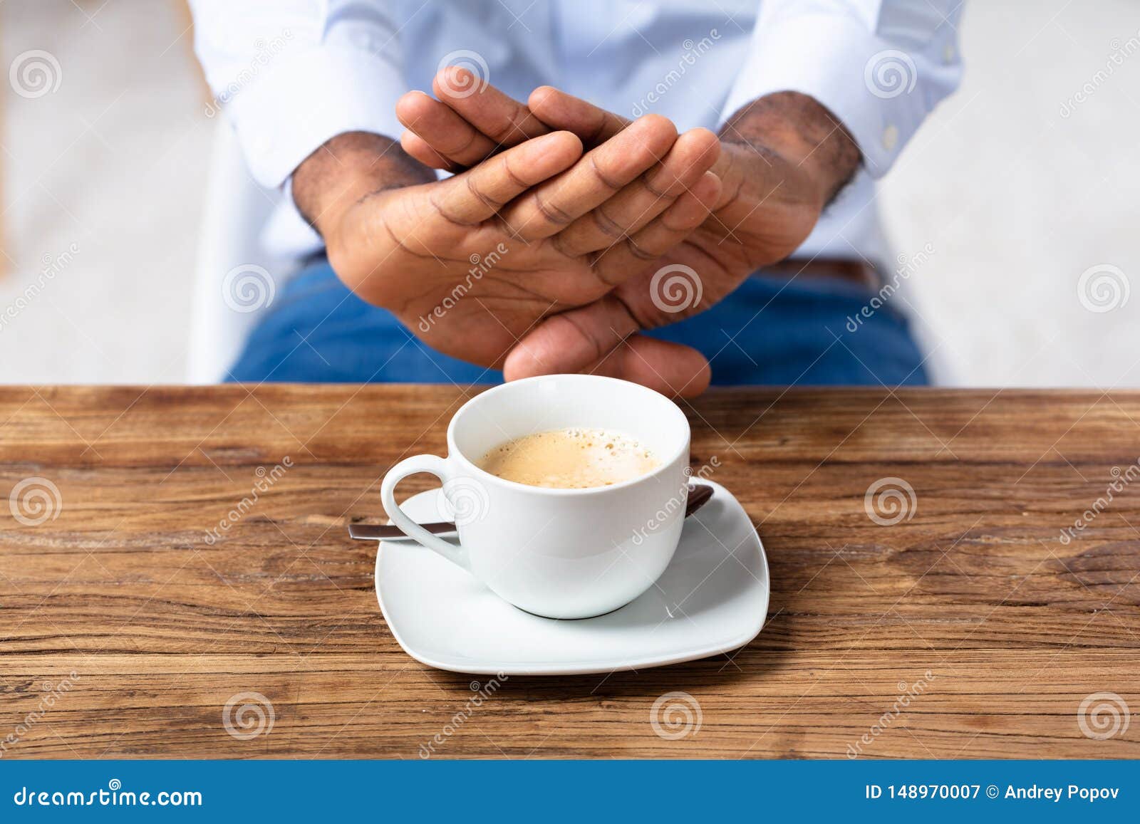 Man Refusing Cup of Coffee stock image. Image of gesture - 148970007