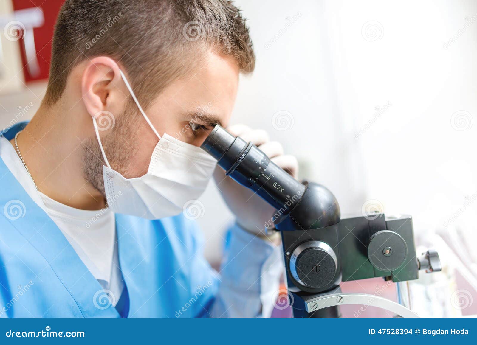 Close-up of Man Researcher Using a Microscope Stock Photo - Image of ...