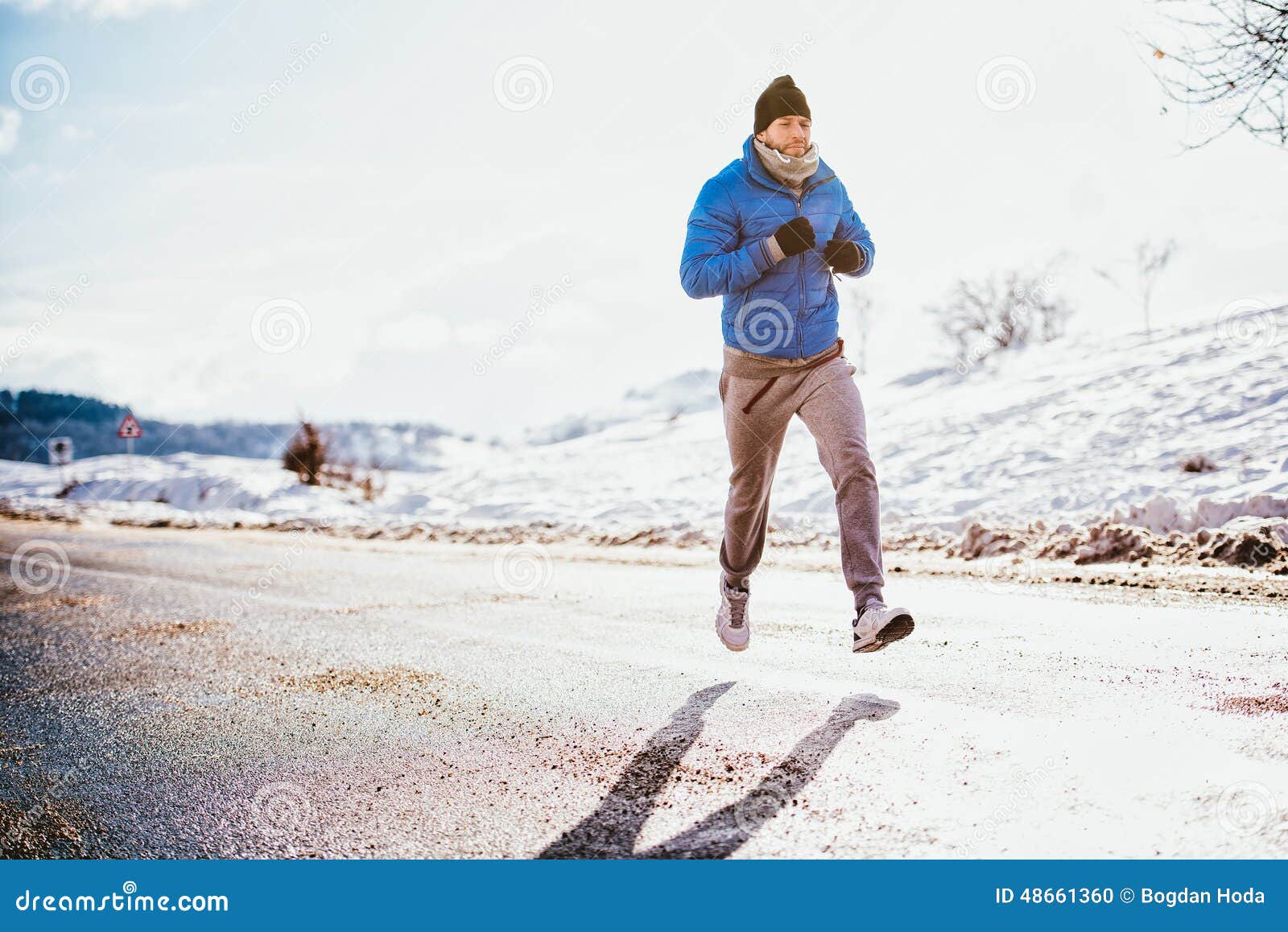Close-up of Man Running and Jogging on a Cold Day Stock Photo - Image ...