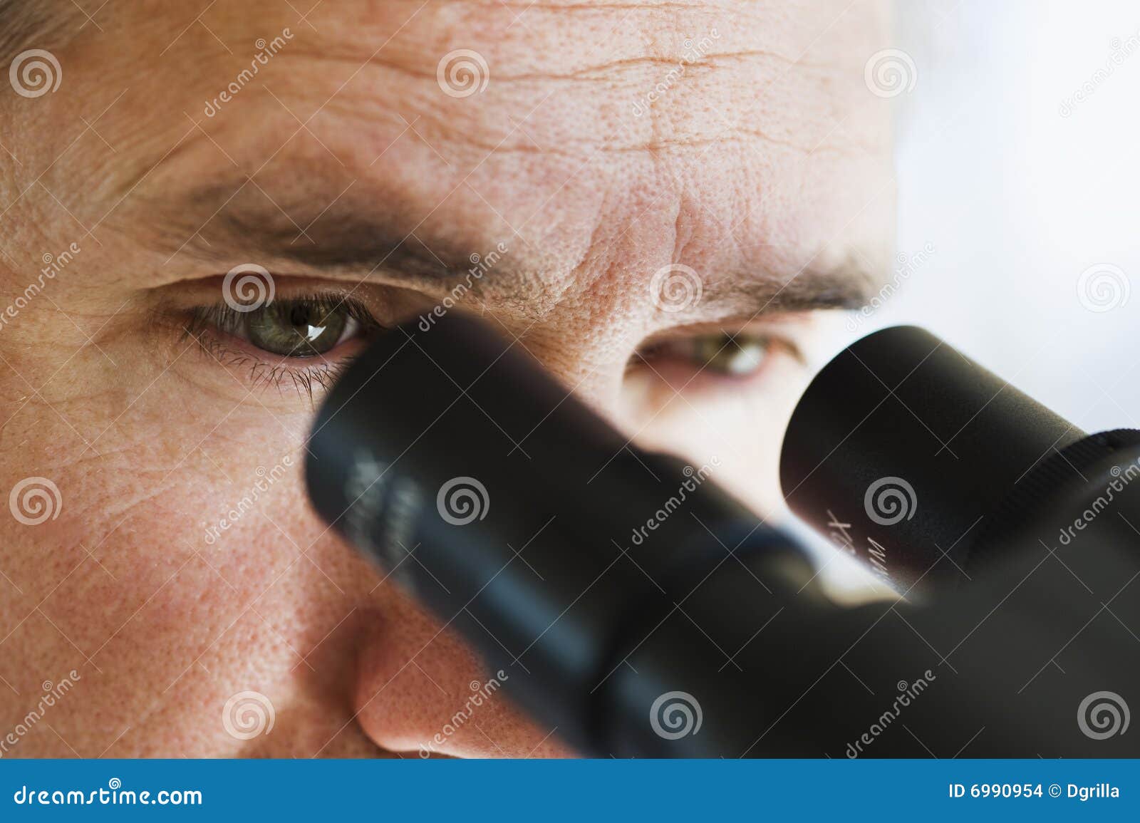 Close Up of Man S Eyes Looking through Microscope Stock Photo - Image ...