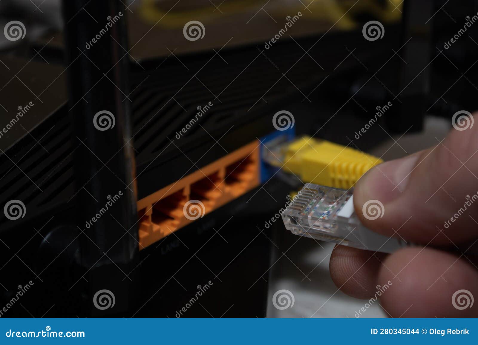 Close-up of a Man S Hand, Fingers Connecting a Network Cable To a ...