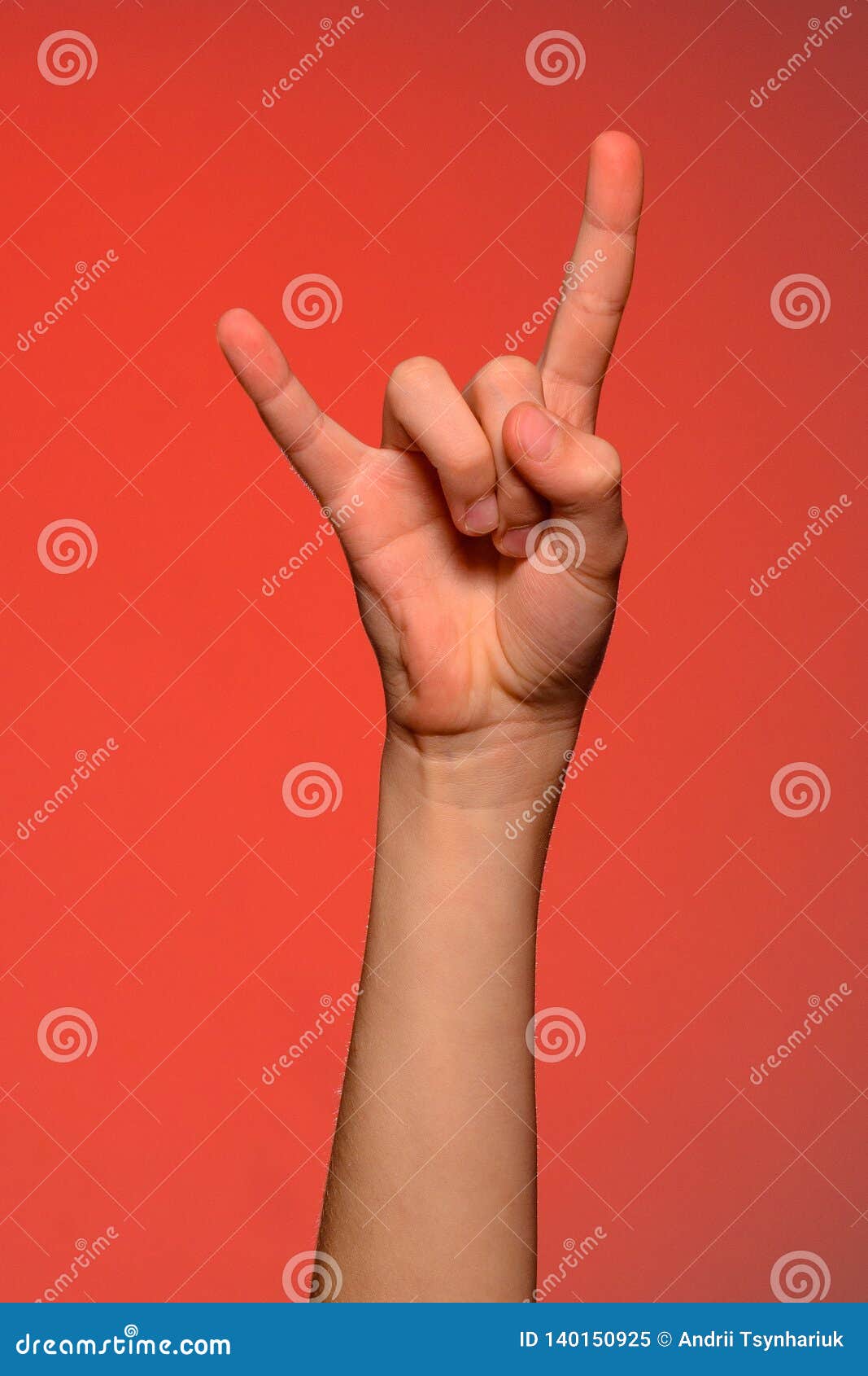 Close-up of a Man`s Hand with a Goat`s Sign on a Red Background Stock ...