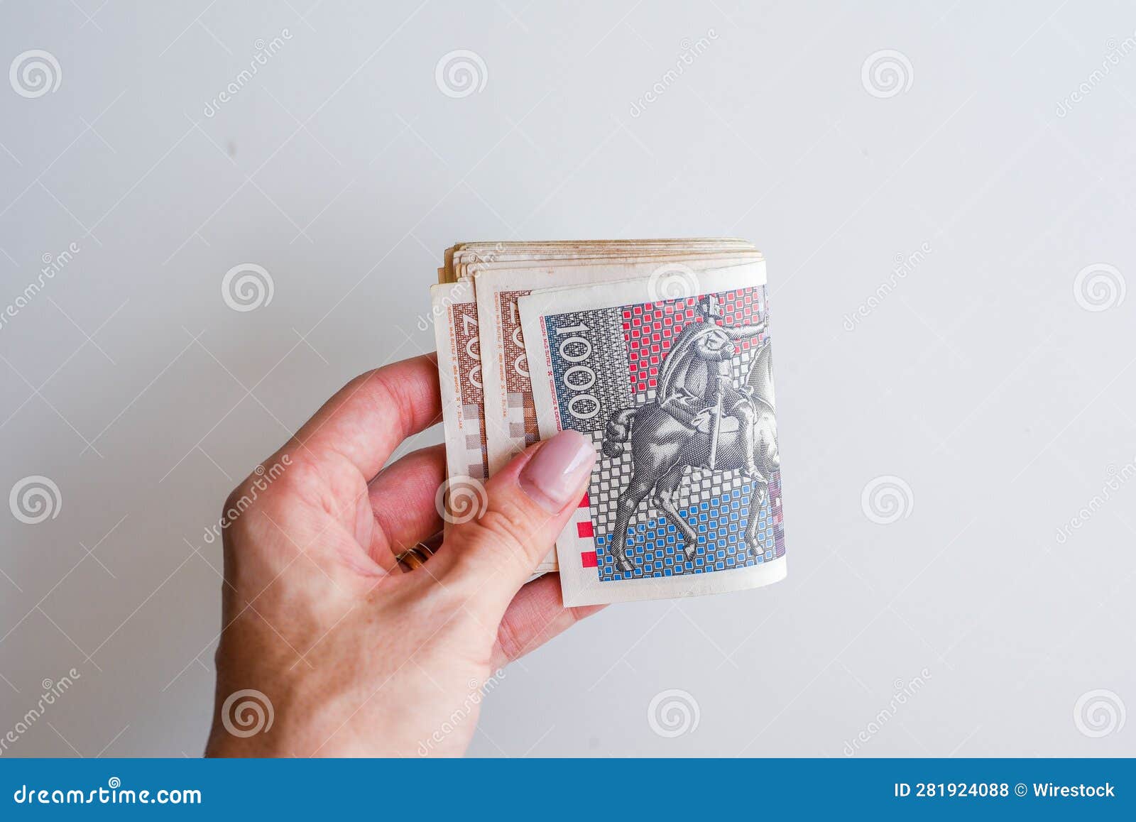 Close Up of a Man S Hand Holding a Stack of Money Stock Photo - Image ...