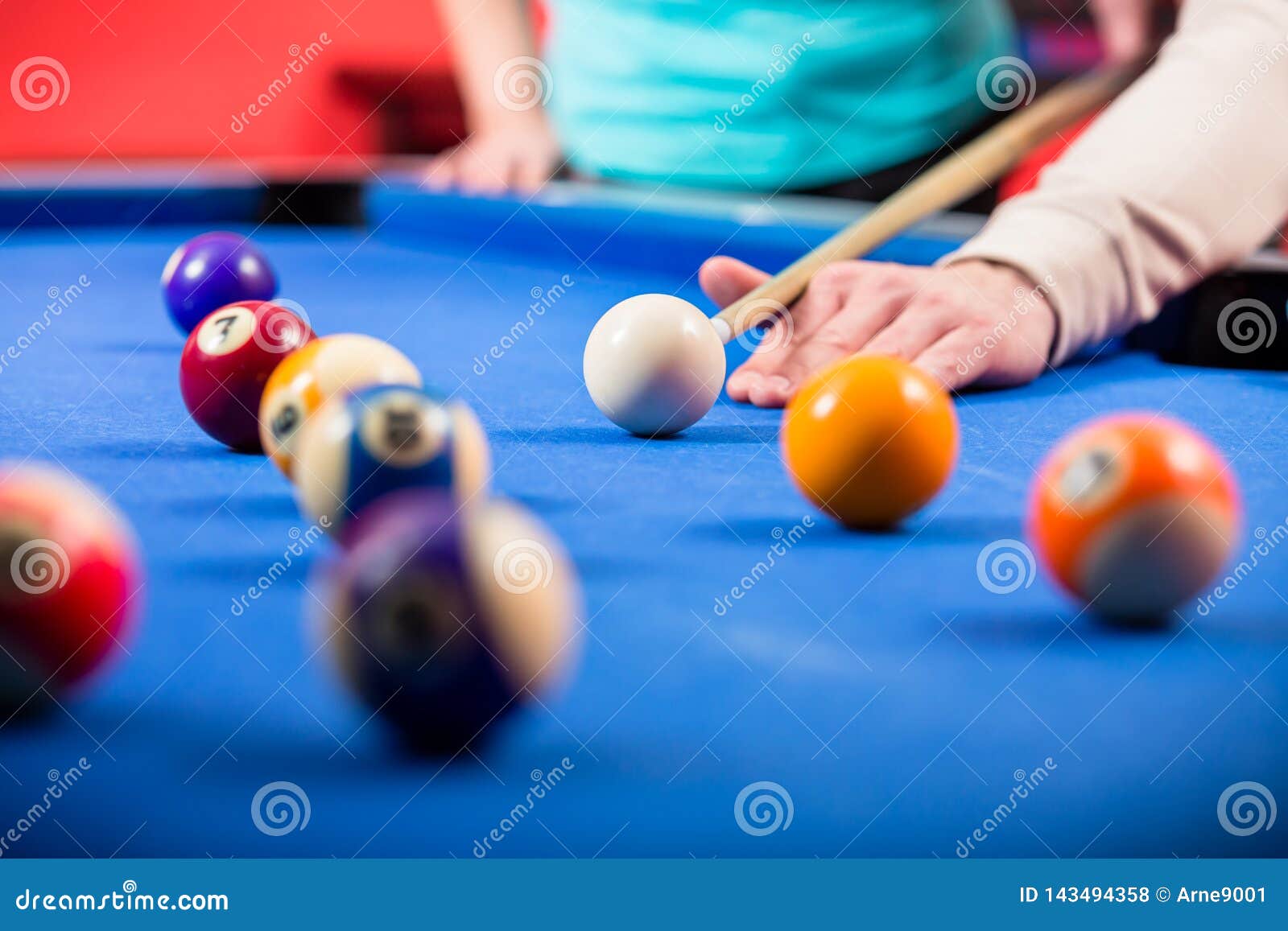 Man Playing Billiard on a Blue Pool Table Stock Photo - Image of ...