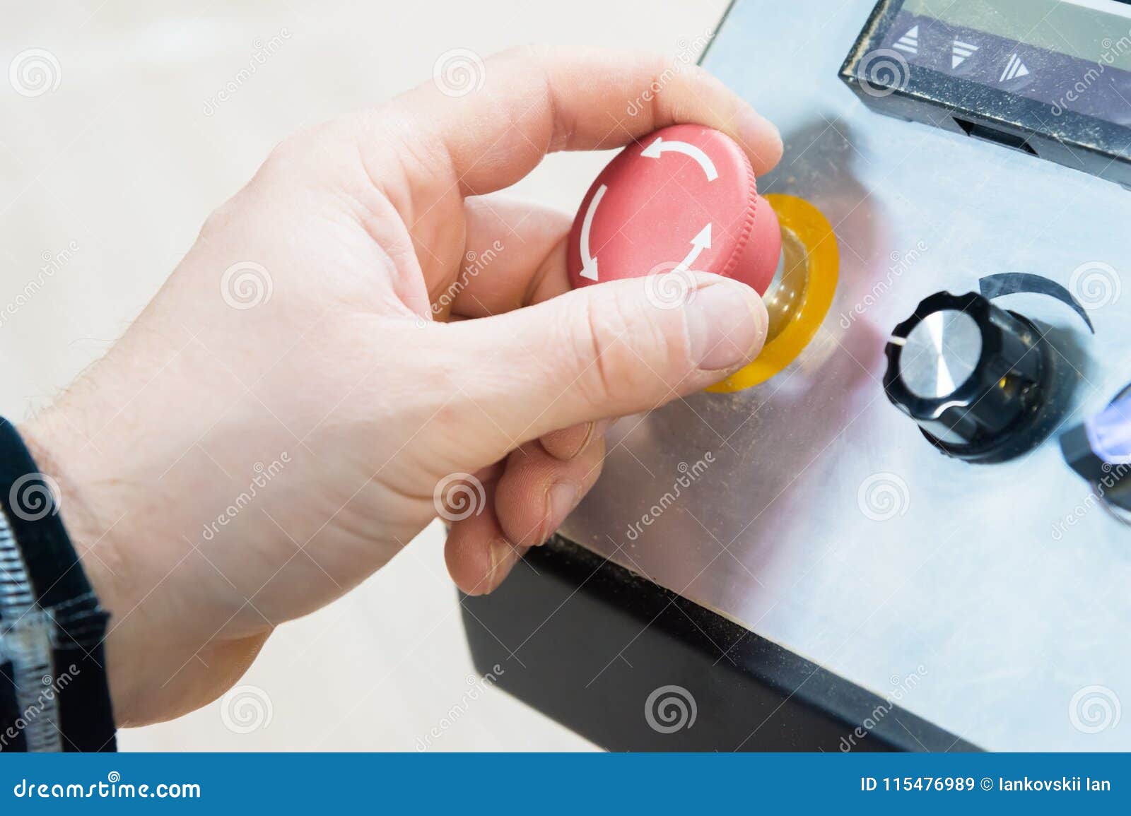 Close-up of a Man`s Hand on a Red Button on the Control Panel ...
