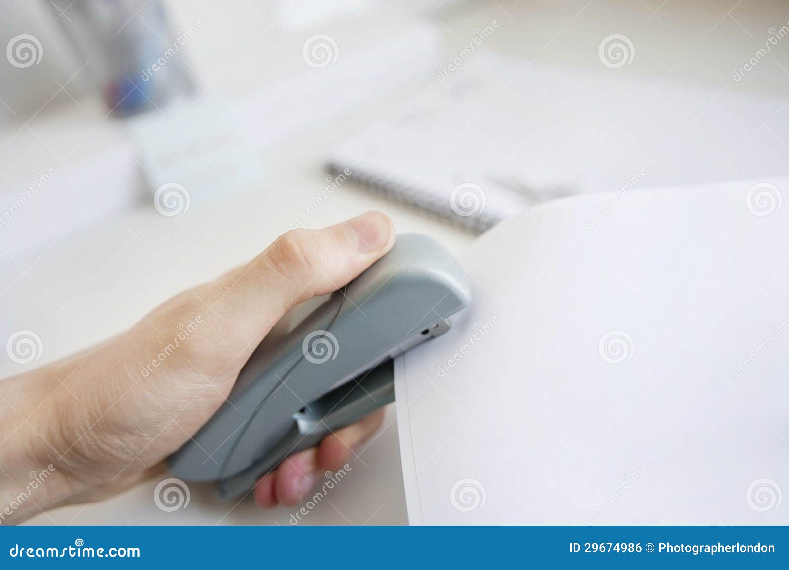 Close-up of Man S Hand Stapling Paper in Office Stock Photo - Image of ...