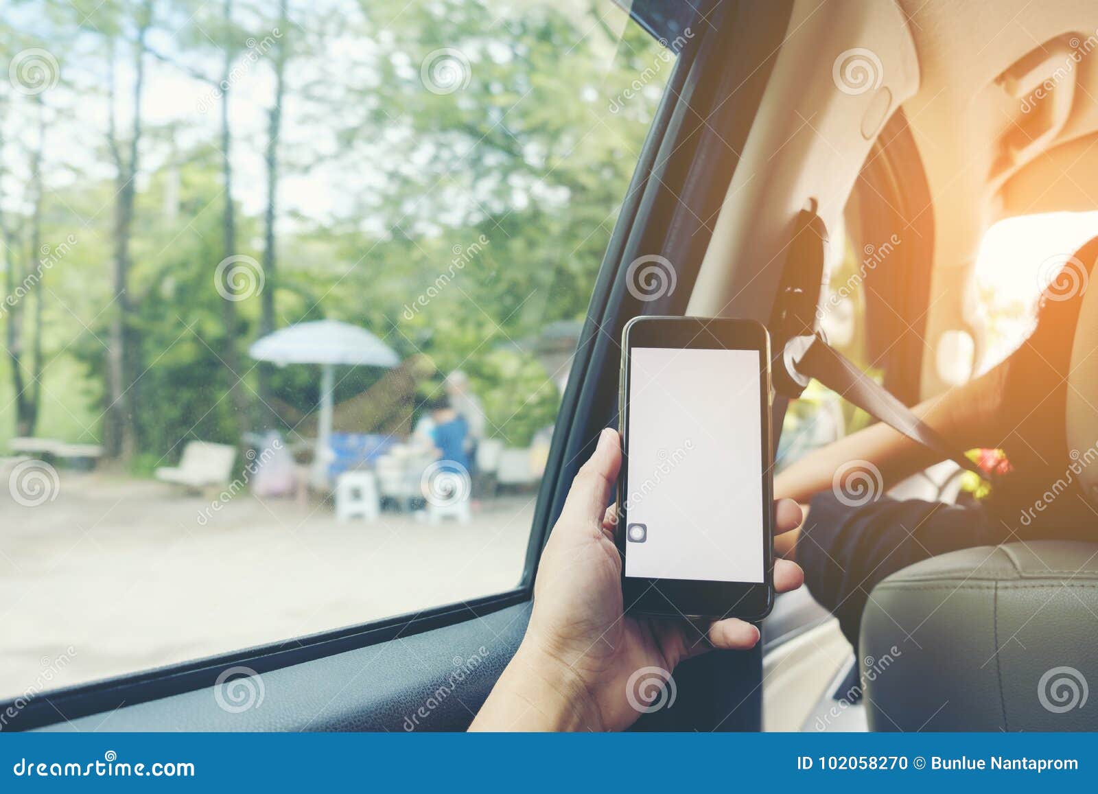 Close-up of Man`s Hands Holding Smartphone in the Car Interior, Stock ...