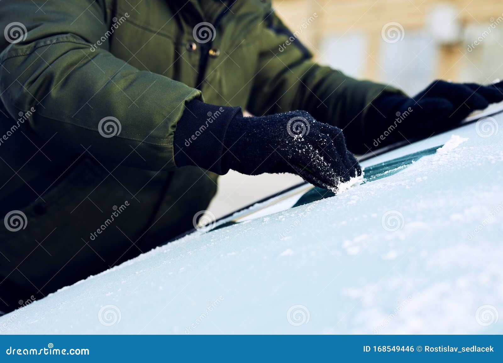 Man Scraping Ice from the Windshield of a Car Stock Photo - Image of ...