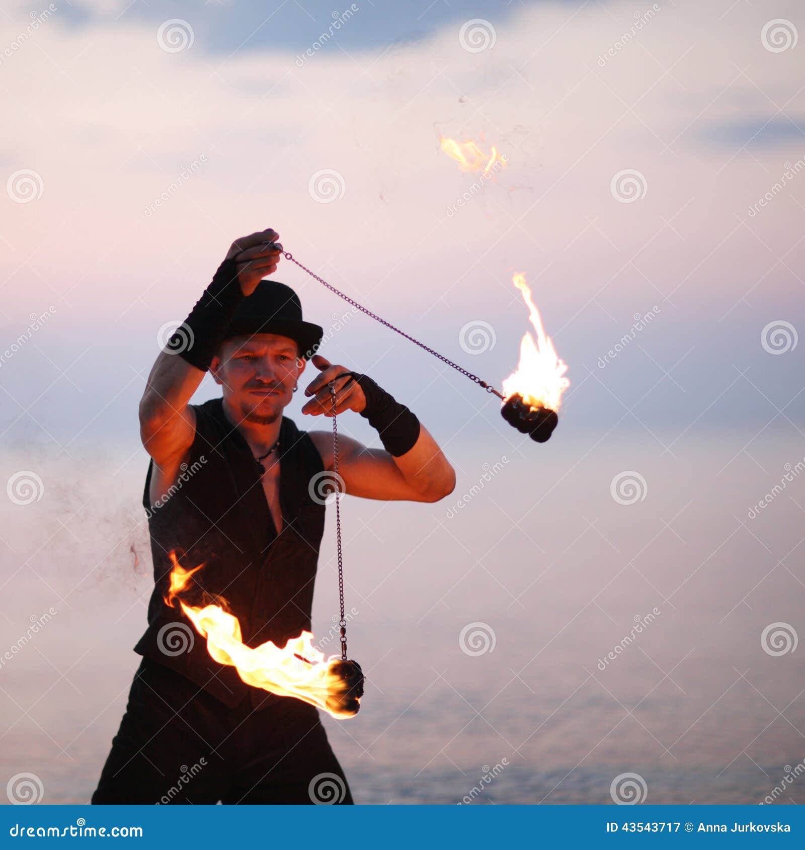 Close Up of a Man Spinning Fire Poi Stock Image - Image of blaze, black ...