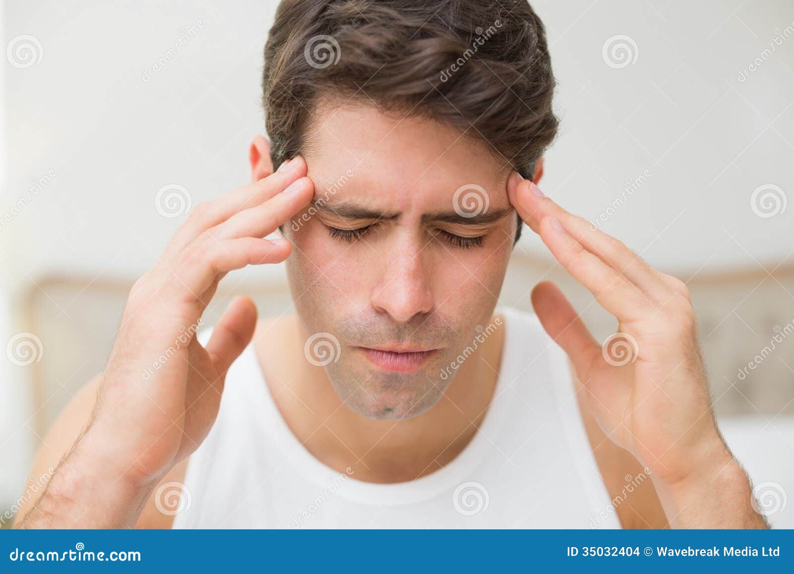 Close Up of Man Suffering from Headache in Bed Stock Photo - Image of ...