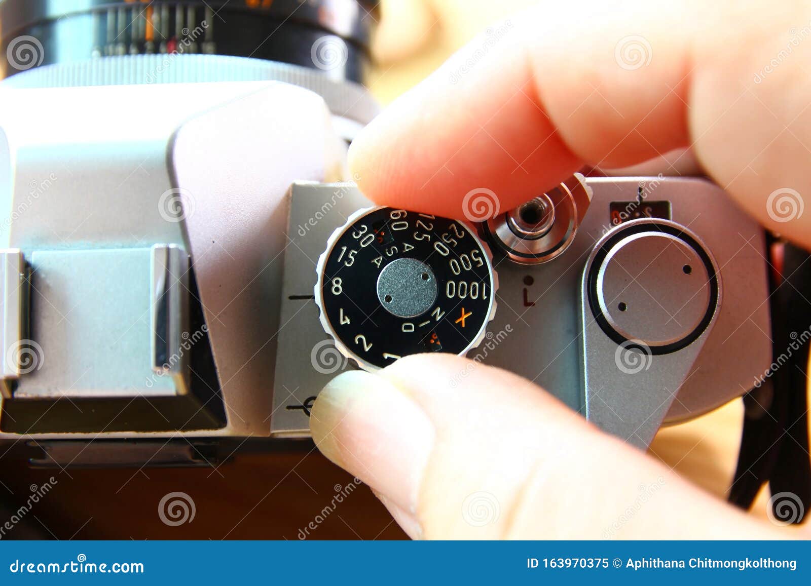 Man is Testing the Speed Shutter Button of Manual Camera Film on Wood ...