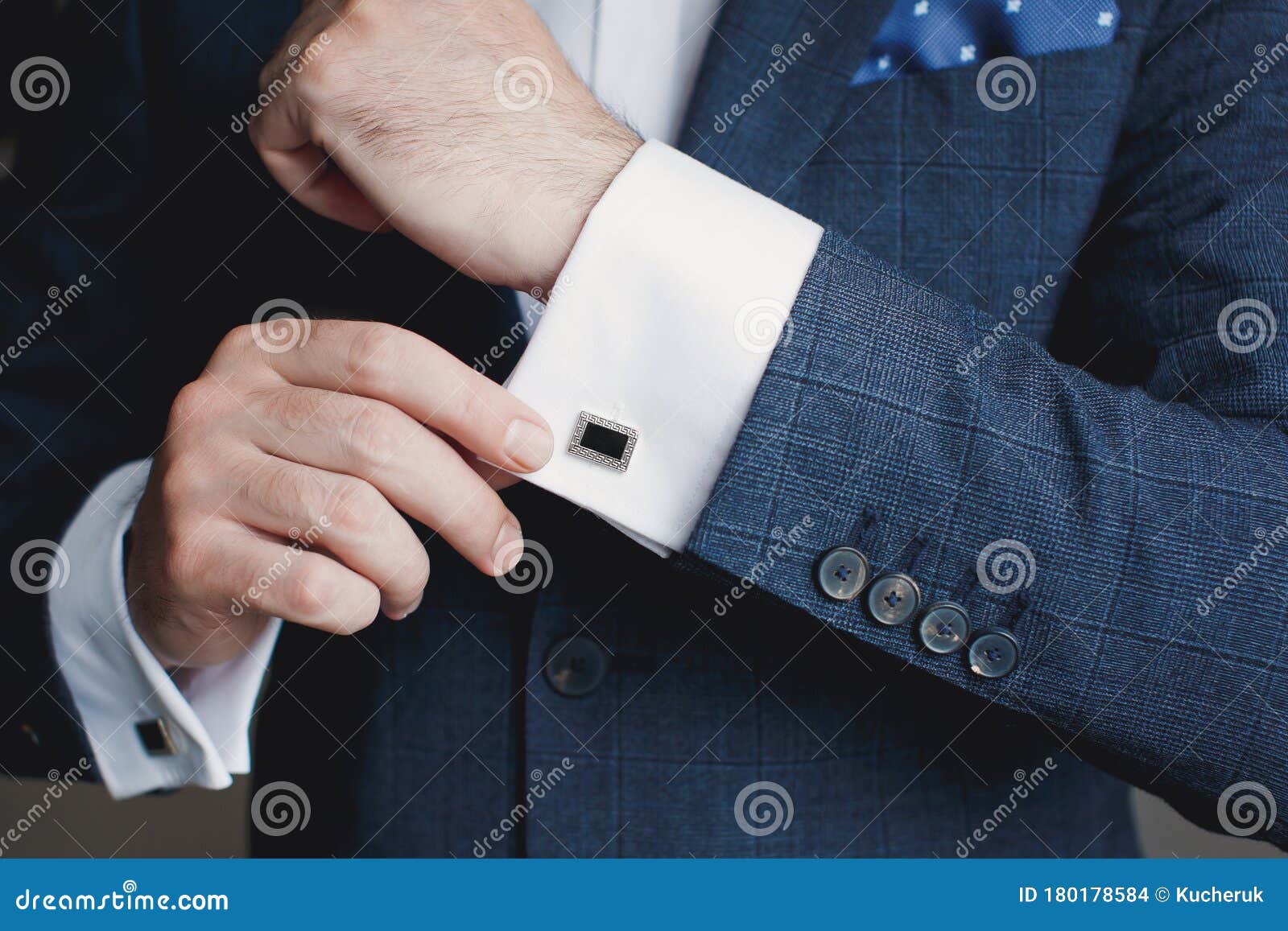 Close-up of a Man in a Tux Fixing His Cufflink. Stock Photo - Image of ...