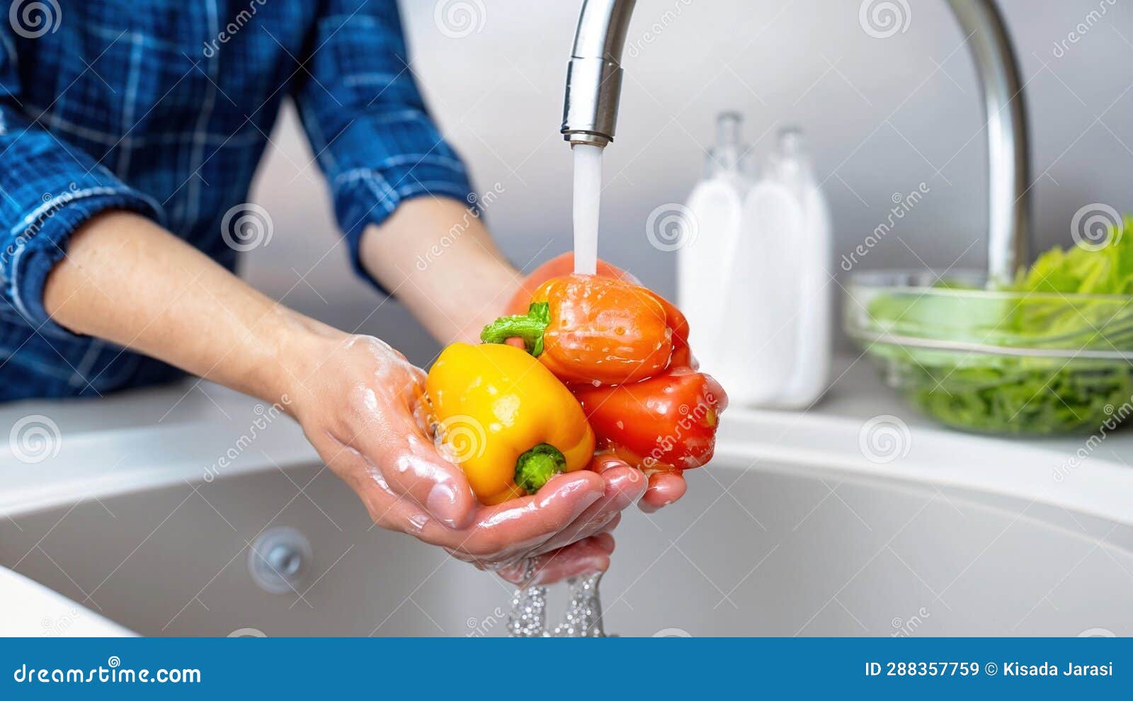 Close-up of Man Washing Vegetables in Kitchen Sink with Water. Stock ...