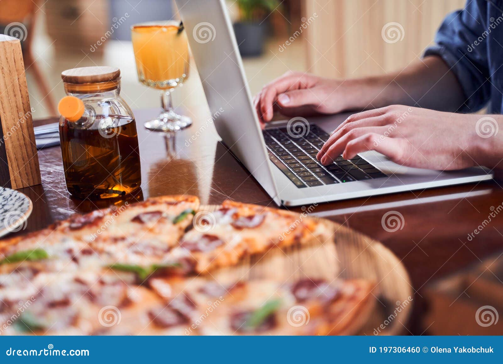 Close Up Man Working on Laptop and Eating Pizza at Workplace Stock ...