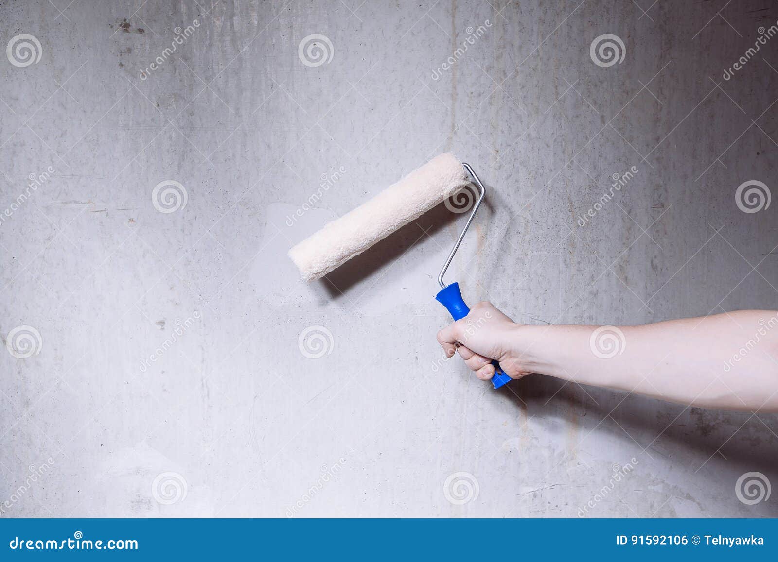 Close-up of Mans Hands Using Paint Roller while Working Stock Photo ...