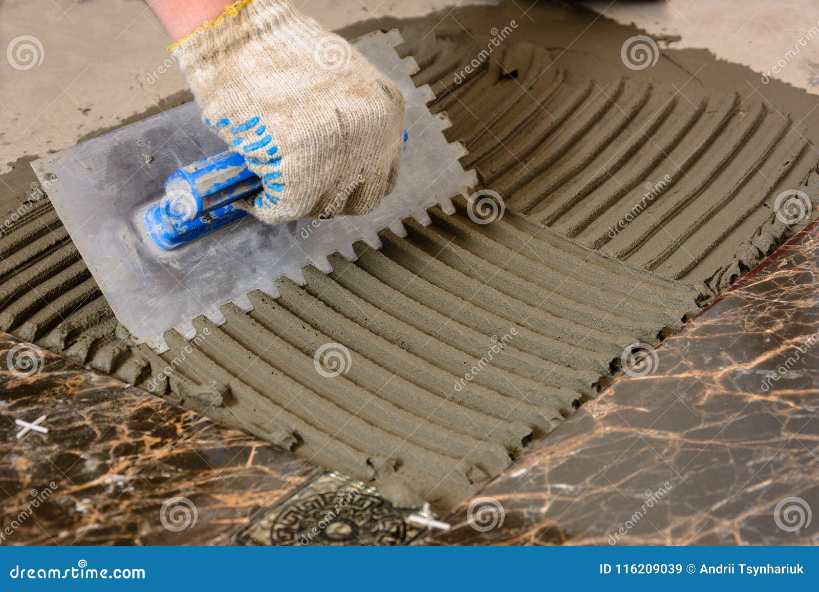 Close-up of a Master`s Hand that Makes Furrows in a Glutinous Solution ...