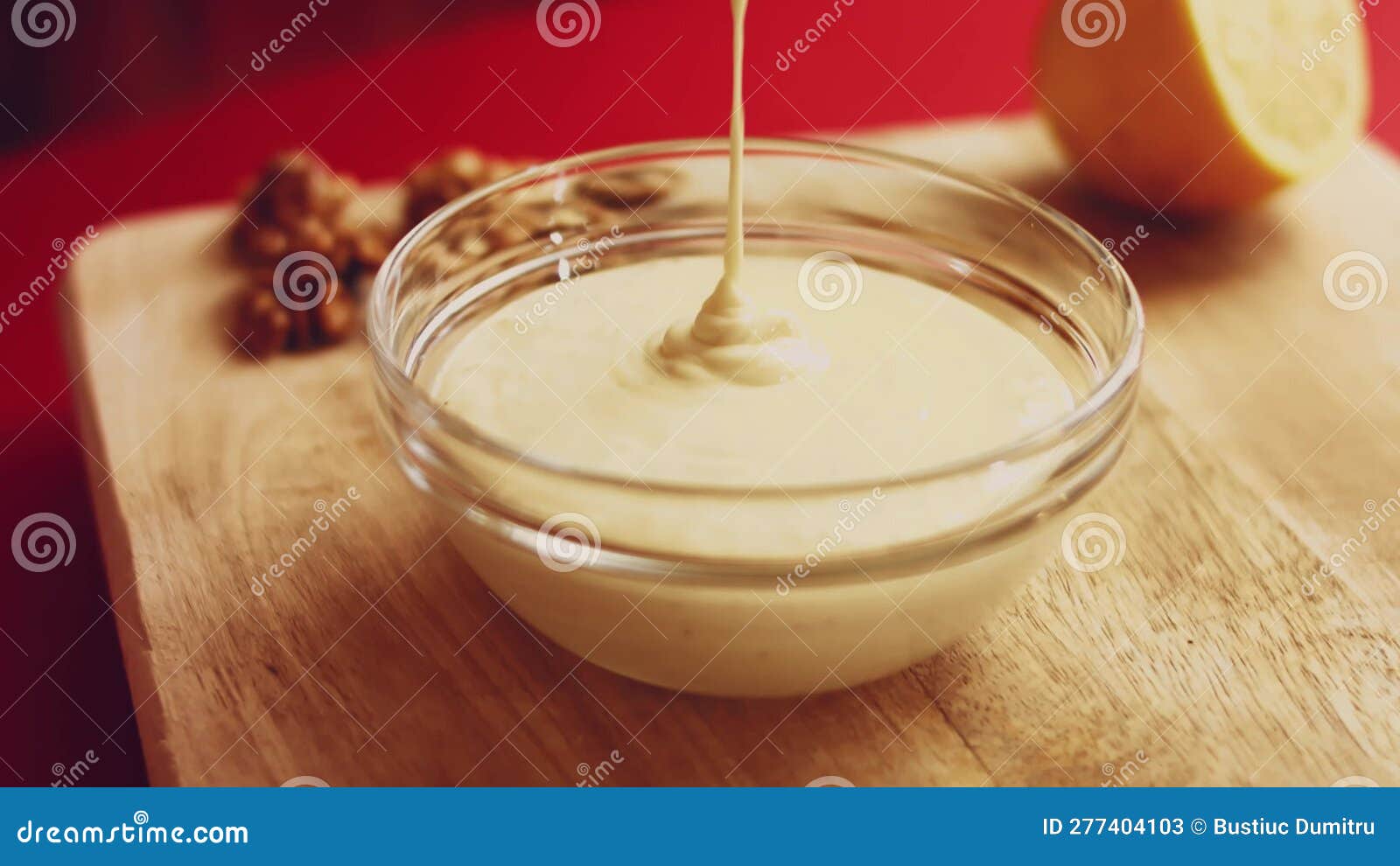 Contour Effect of Close-up of a Mayonnaise Liquid Flowing Down into the ...