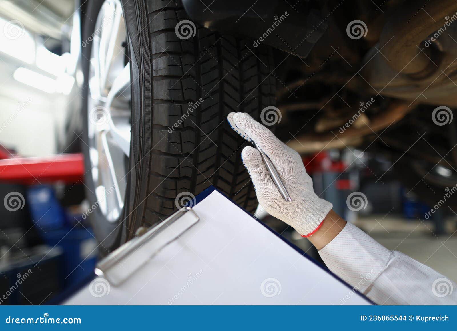 Mechanic Worker Point at Tyre and Write Down in Document Notes Stock ...