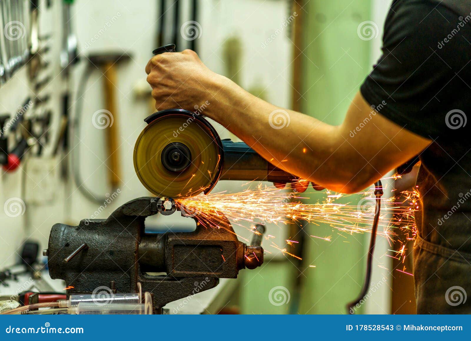 Close-up of a Mechanic Working As a Grinder, Sparks Fly Stock Image ...