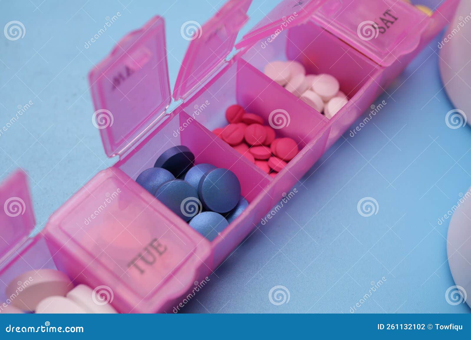 Close Up of Medical Pills in a Pill Box on Table Stock Photo - Image of ...