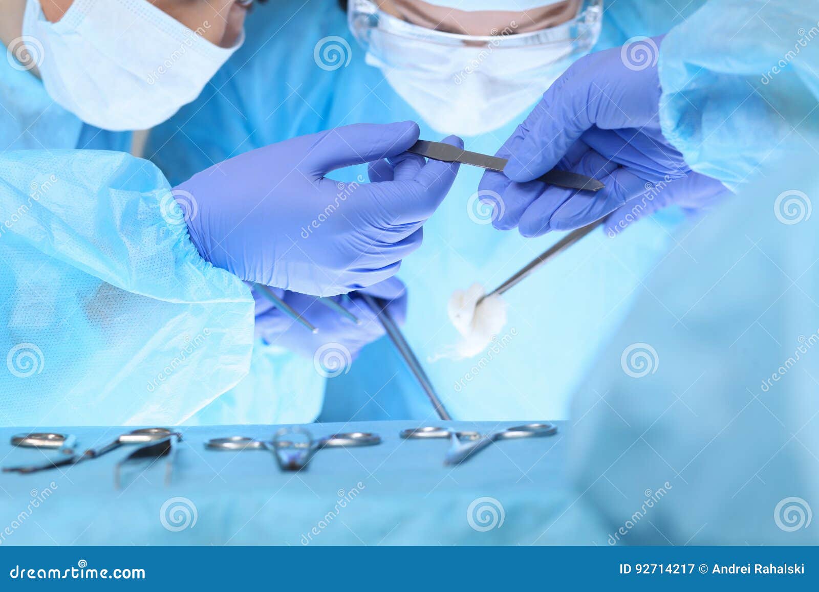 Close Up of Medical Team Performing Operation. Group of Surgeons at ...