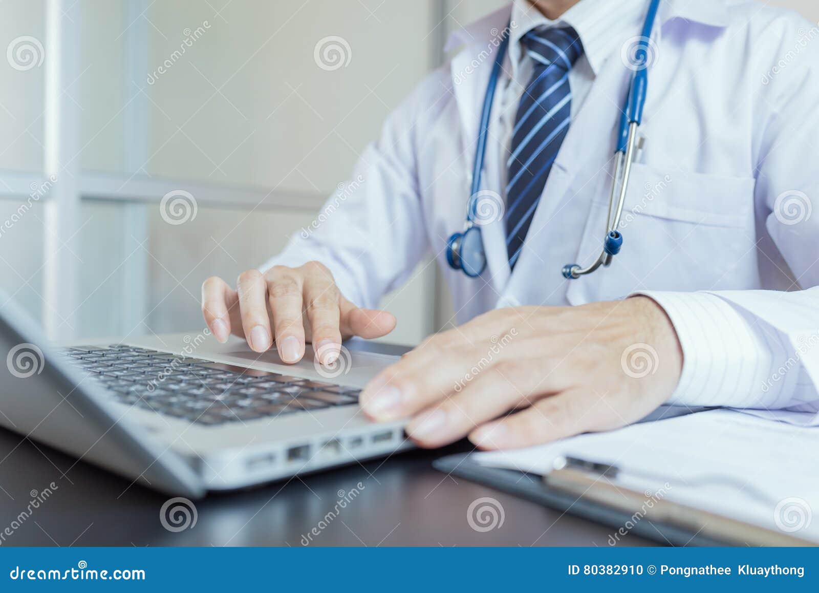 Close-up of a Medical Worker Typing on Laptop Stock Photo - Image of ...