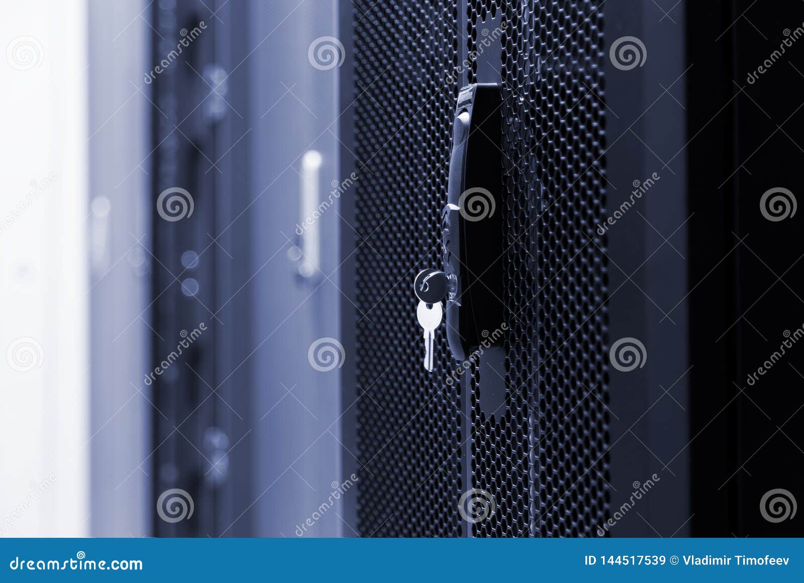 Close Up Meshed Door With Key In Lock. Button In Server Room. Blur ...