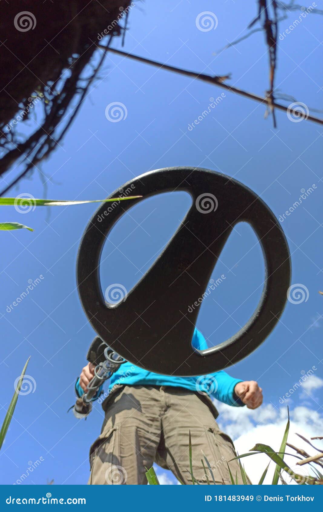 Close-up of a Metal Detector with a Treasure Hunter from a Digging Hole ...