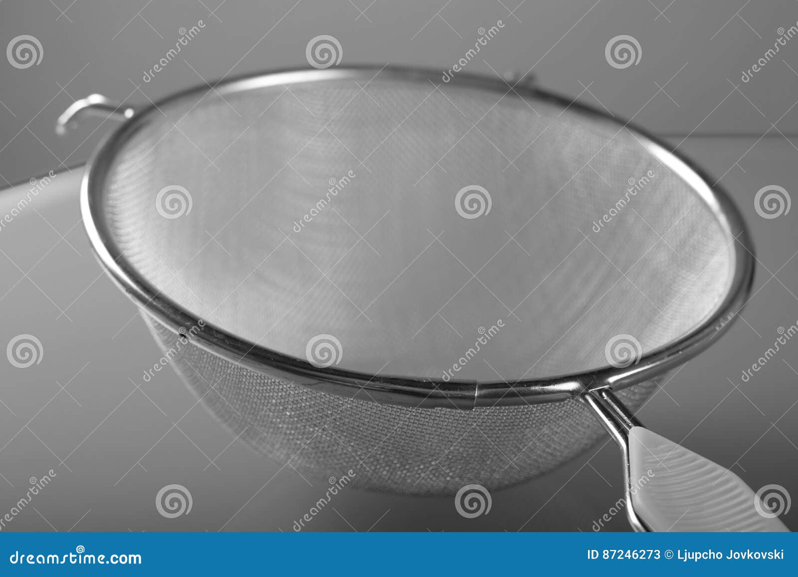 Close Up of Metallic Strainer with Plastic Handle Stock Image - Image ...