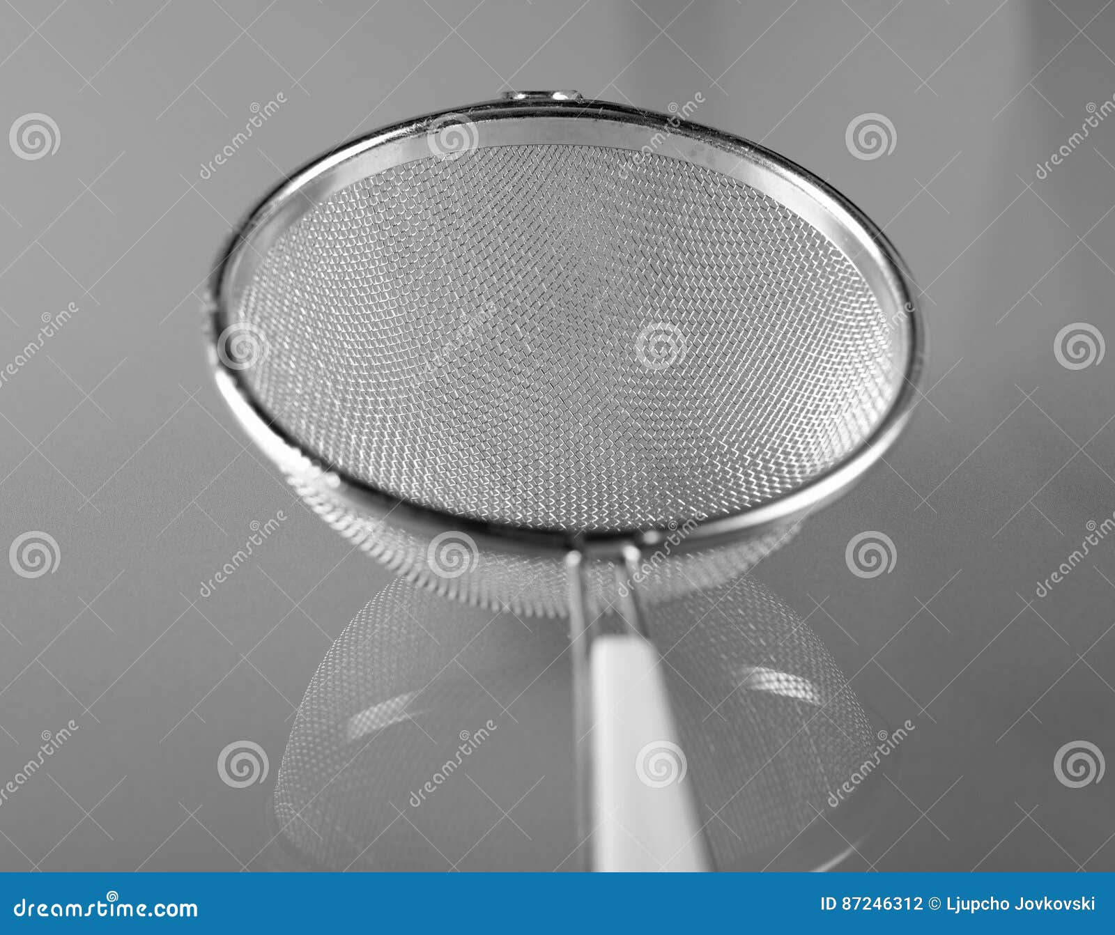 Close Up of Metallic Strainer with Plastic Handle Stock Photo - Image ...